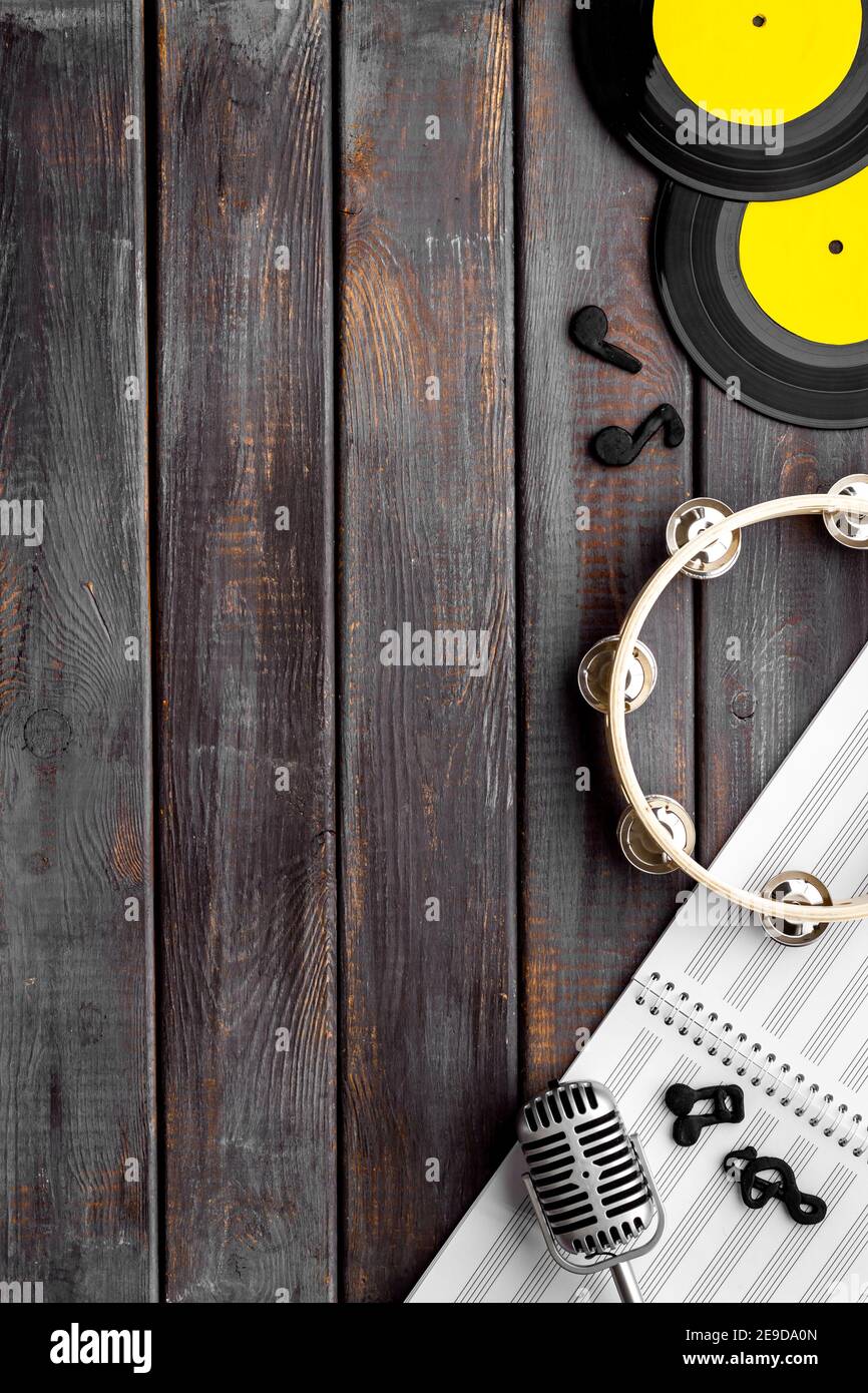 Frame of of music background - instrument with sheet music, top view ...