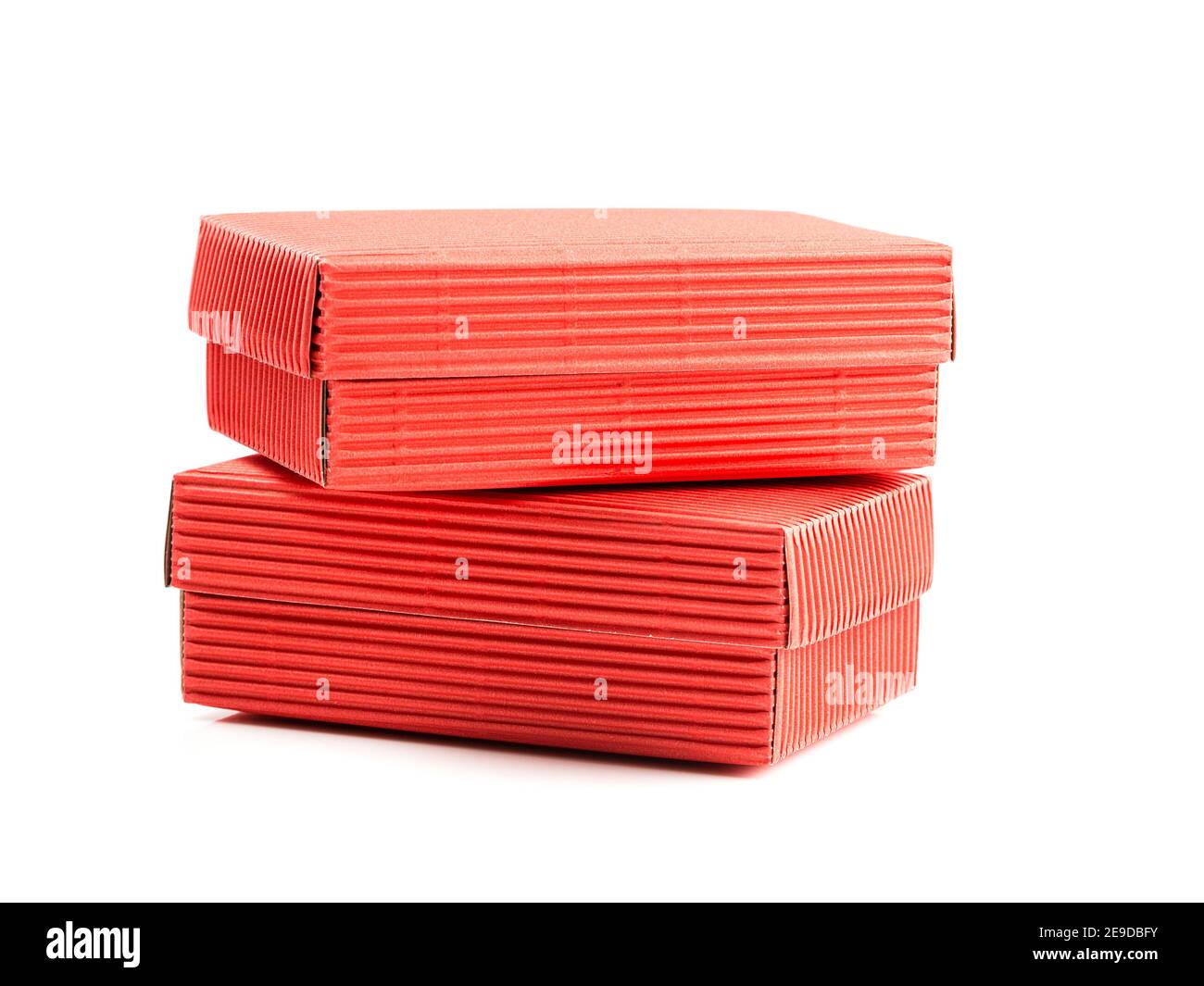Two red closed corrugated cardboard boxes isolated on white. Valentine ...