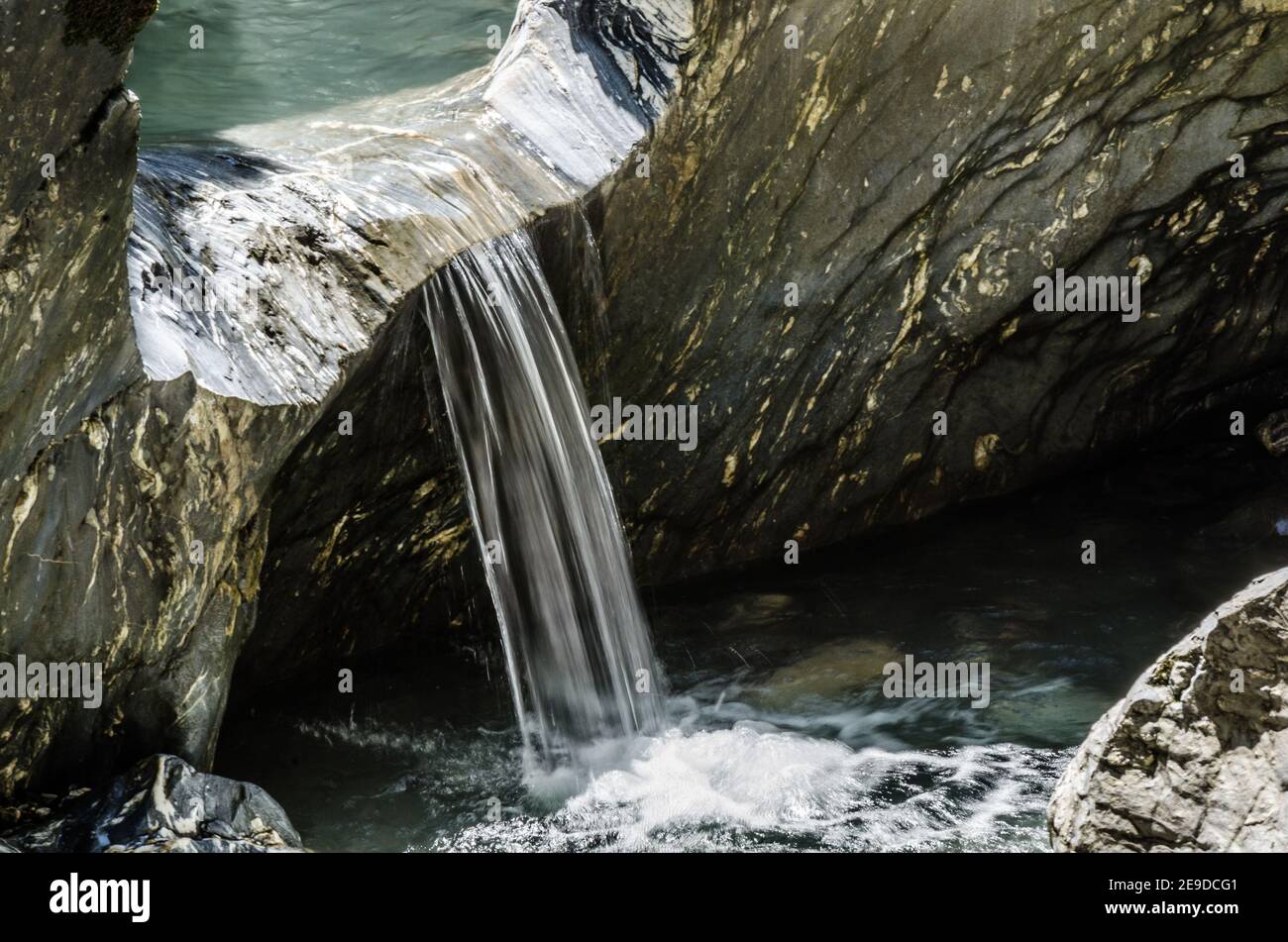 overflowing water at rocks in a ravine Stock Photo - Alamy