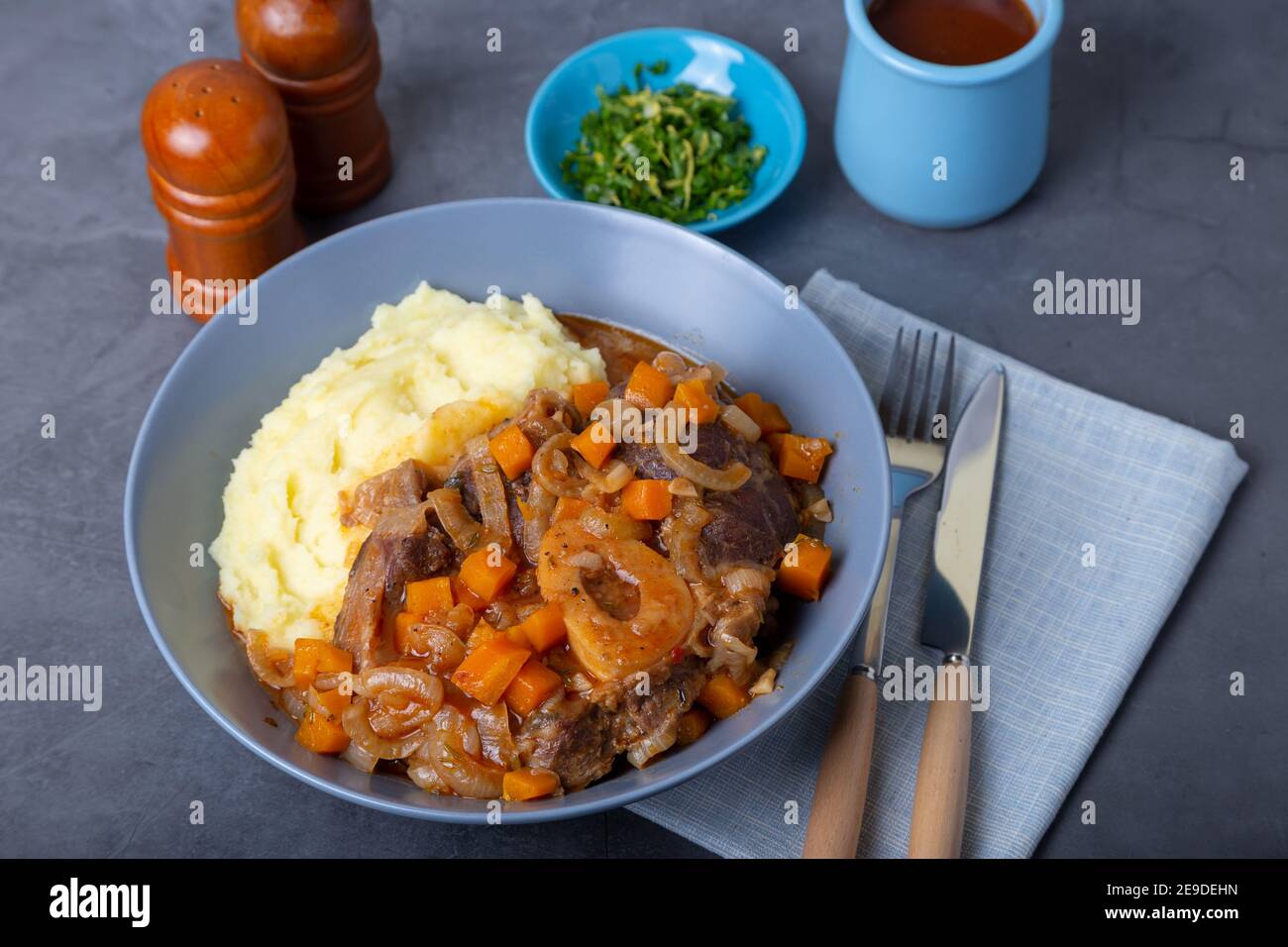 Ossobuco. Veal (beef) shanks with mashed potatoes, gremolata and sauce ...