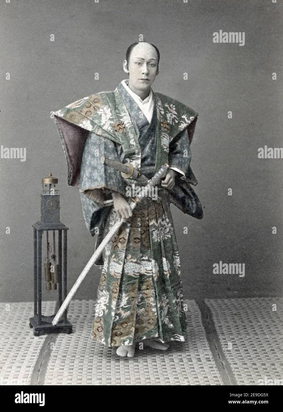 Late 19th century photograph - Japense samurai (actor) with a clock ...