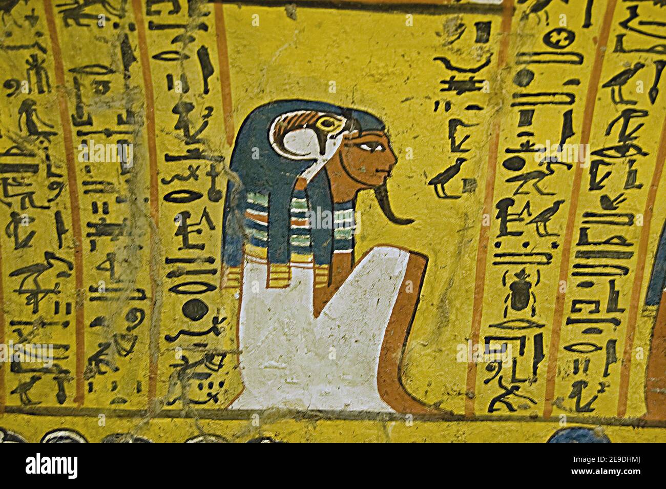 Ancient Egyptian wall painting of the god Horus sitting beside the ...