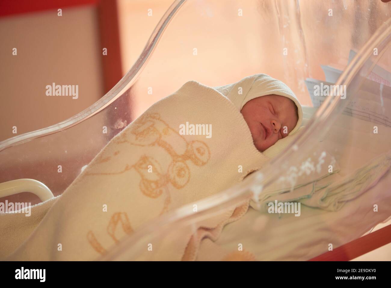 newborn baby sleeping in bed at hospital Stock Photo - Alamy