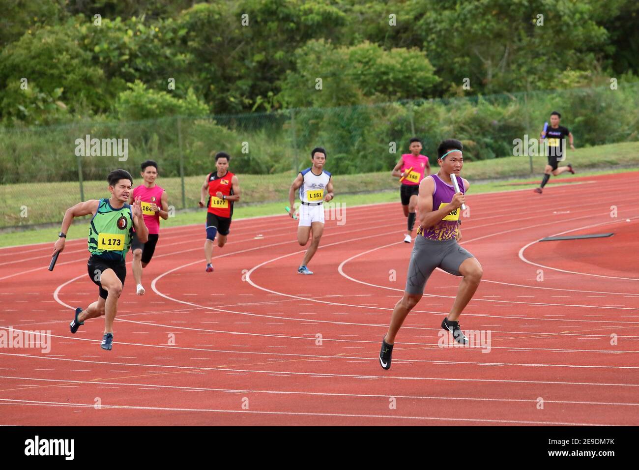Man on running track hi-res stock photography and images - Alamy