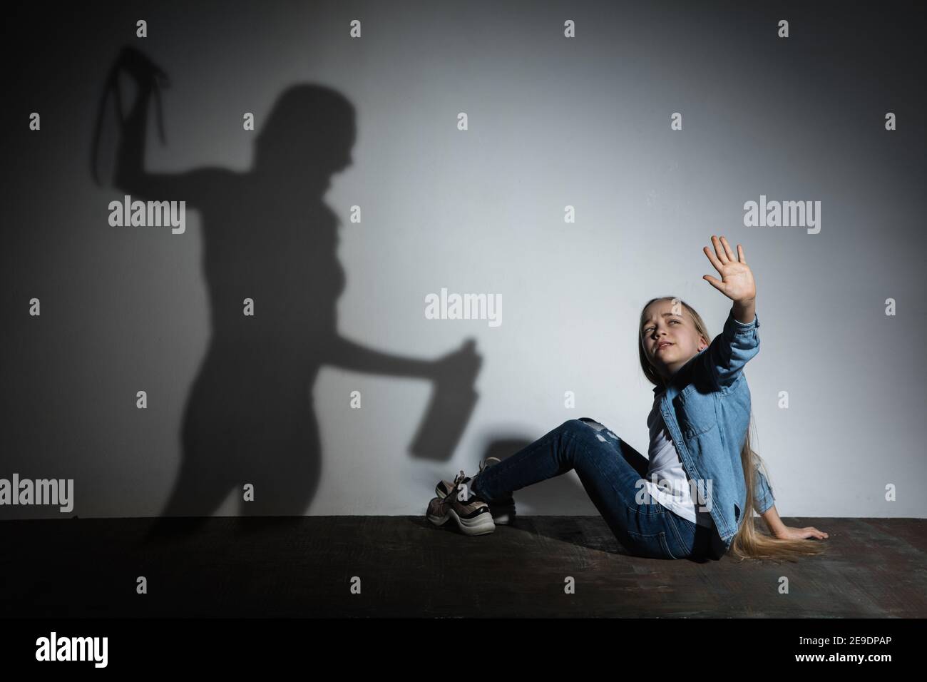 Domestic physical violence, abusing. Scared little caucasian girl ...