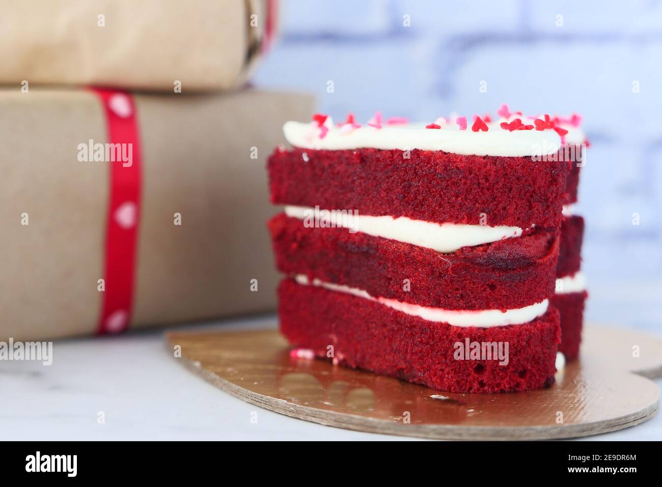heart shape cake, gift box, and rose flower on white background Stock ...