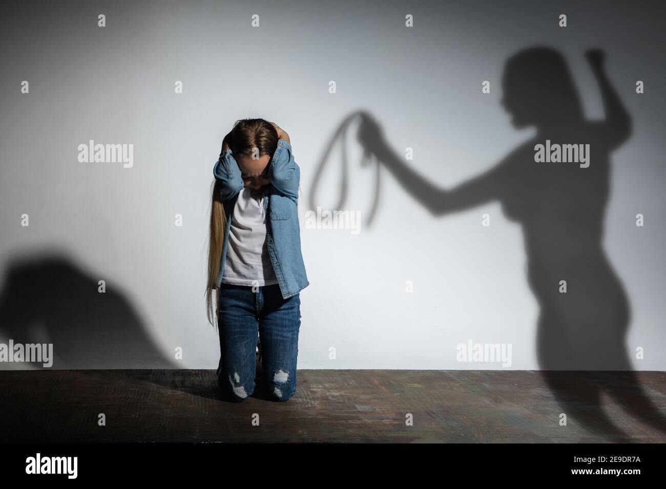 Domestic violence, abusing. Scared little caucasian girl, victim ...