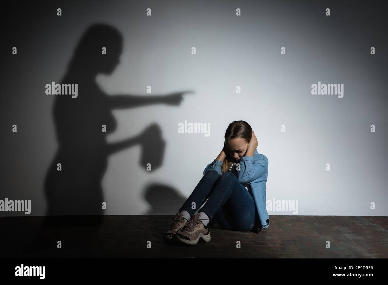 Domestic physical violence, abusing. Scared little caucasian girl ...