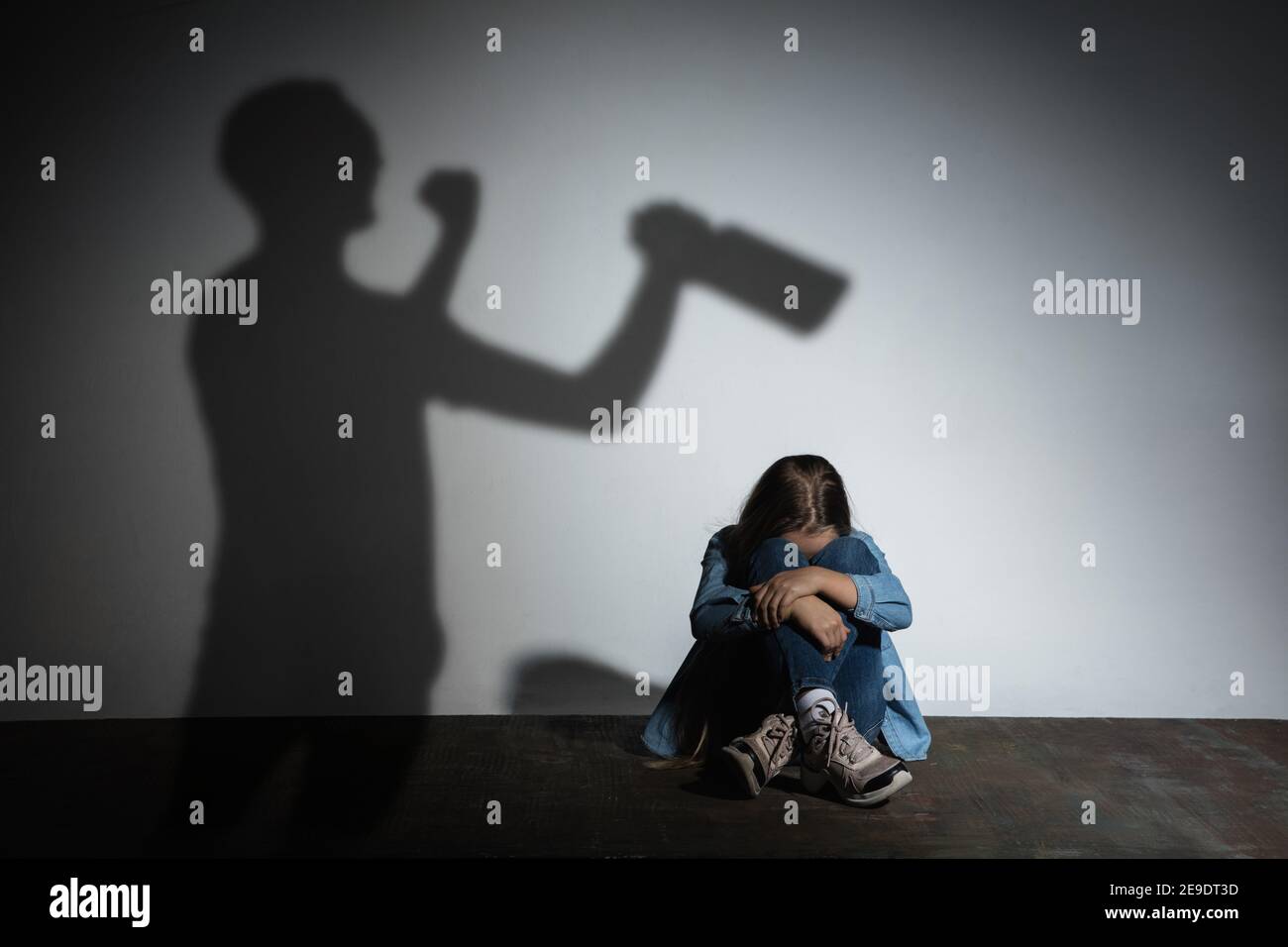 Domestic physical violence, abusing. Scared little caucasian girl ...