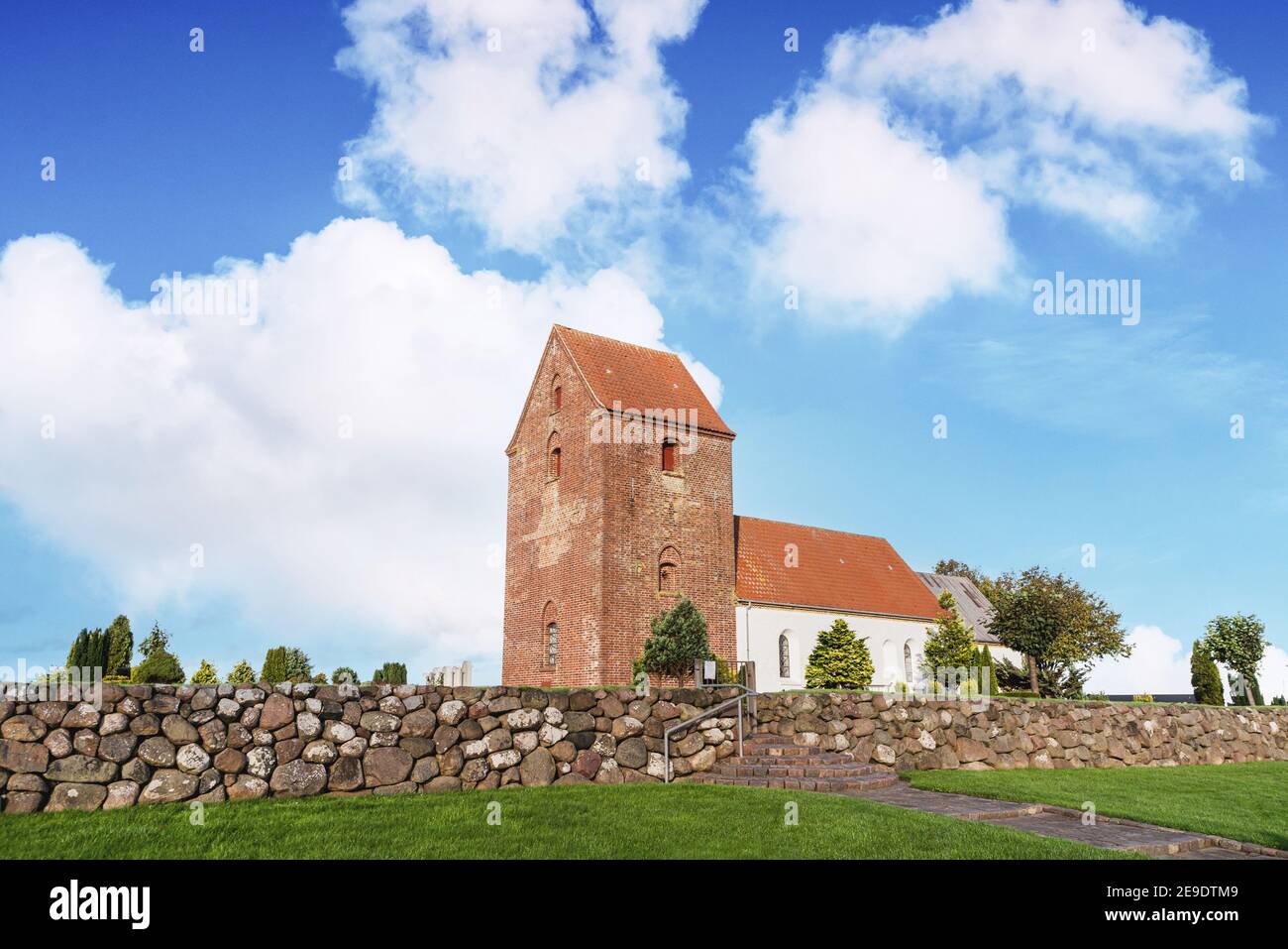 Danish church made of red bricks under a beautiful blue sky in the ...