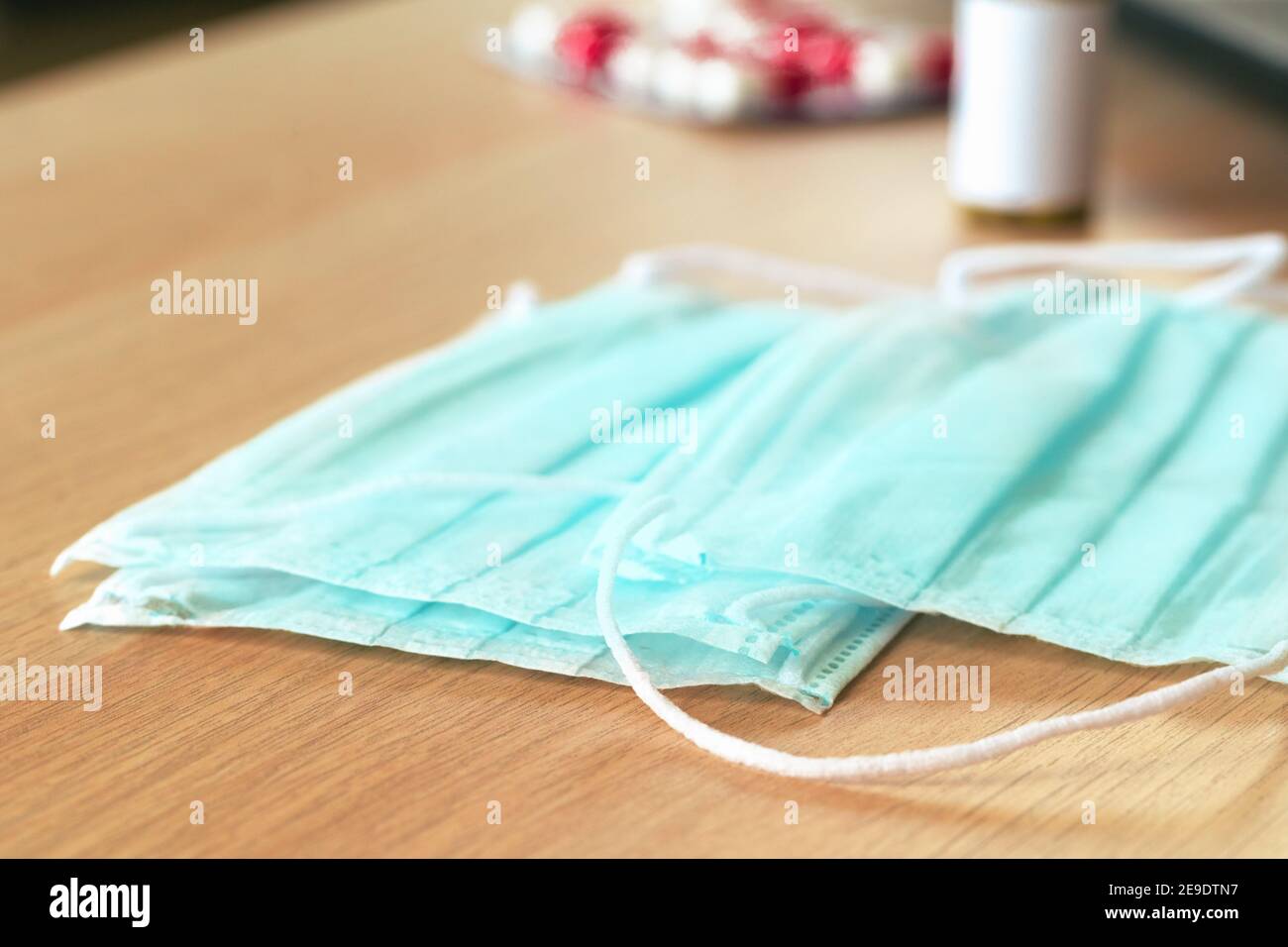 Medical protective mask on office table. Coronavirus spread prevention ...