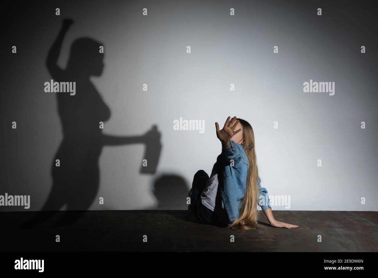 Domestic physical violence, abusing. Scared little caucasian girl ...