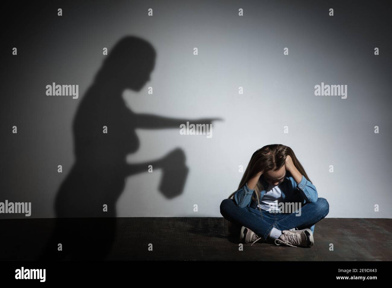 Domestic physical violence, abusing. Scared little caucasian girl ...
