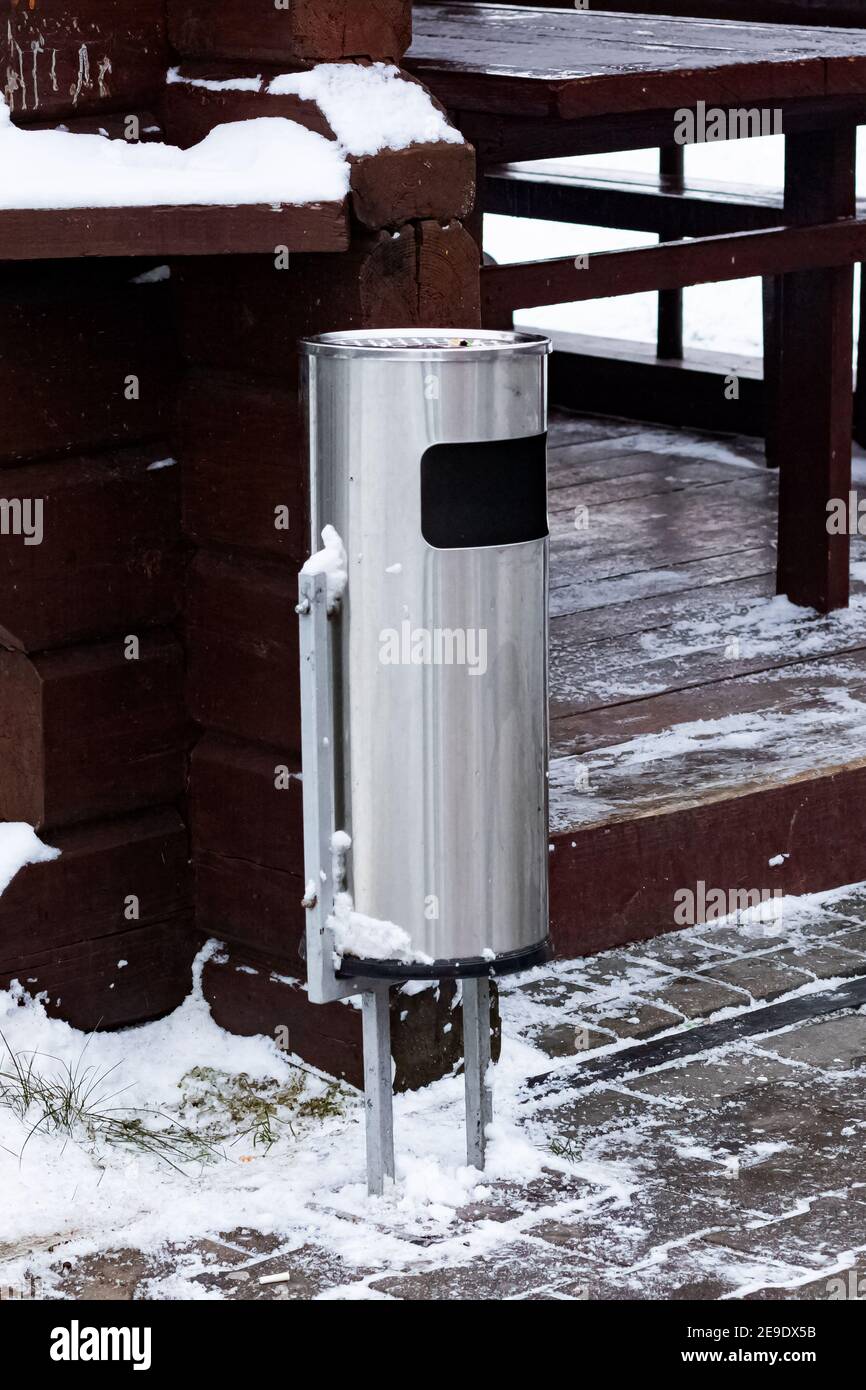 Rubbish bin smoking area on the street close up Stock Photo - Alamy
