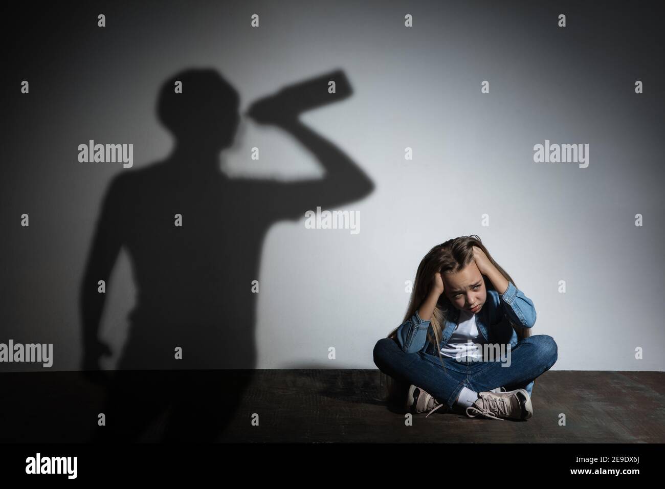 Domestic physical violence, abusing. Scared little caucasian girl ...