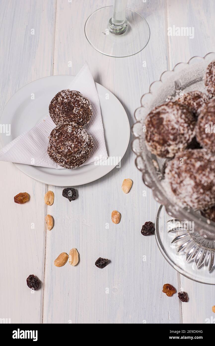 Two oats bonbons in a plate in a white background Stock Photo - Alamy