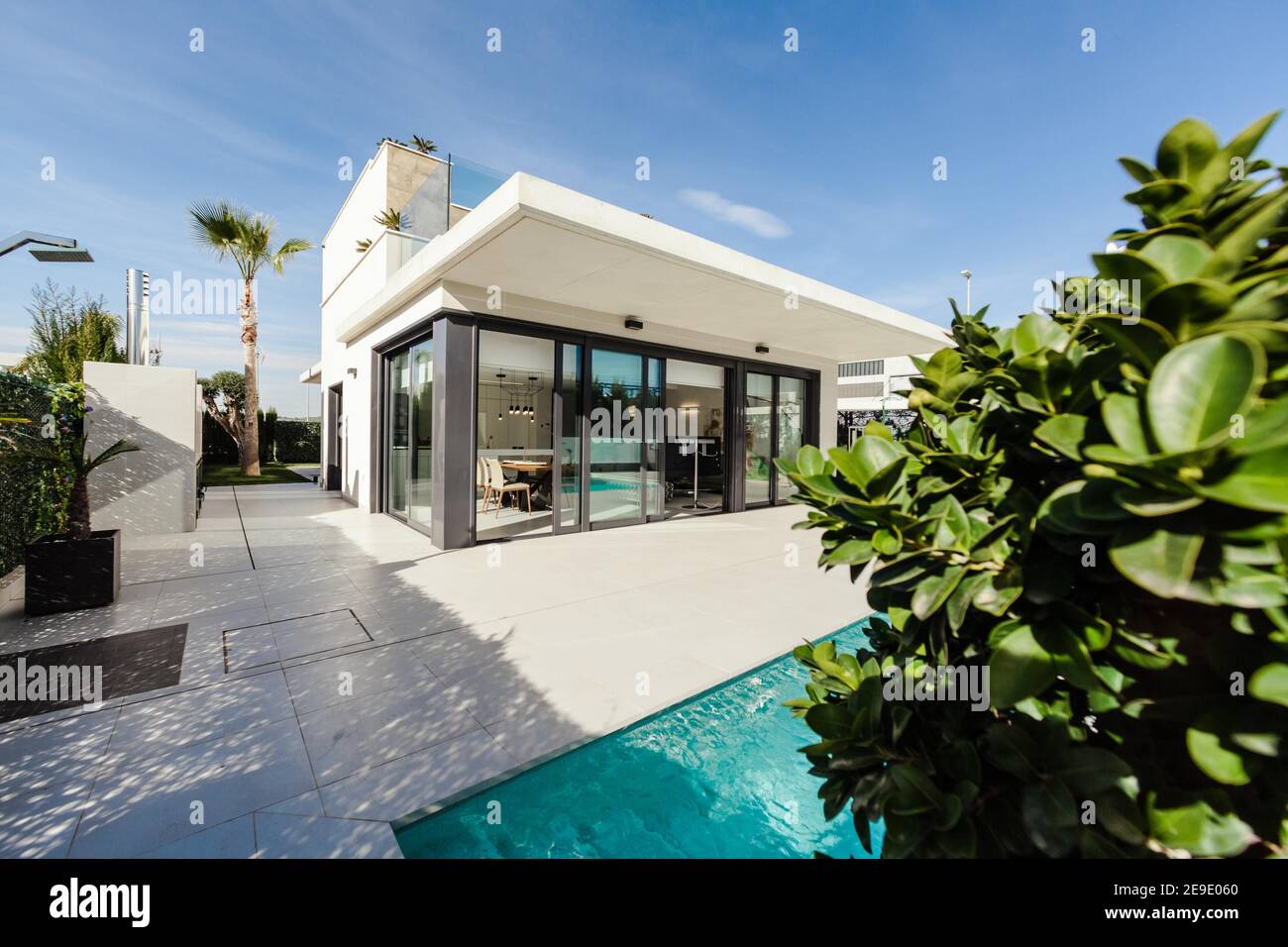 Modern contemporary resort house exterior design with glass walls and ...