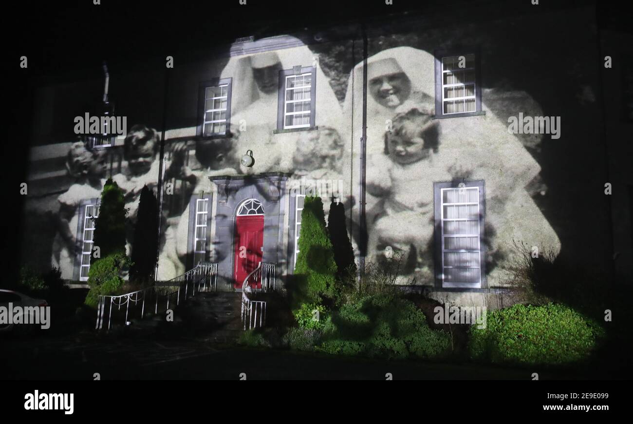 A picture of mother and baby homes projected onto Sean Ross Abbey ...