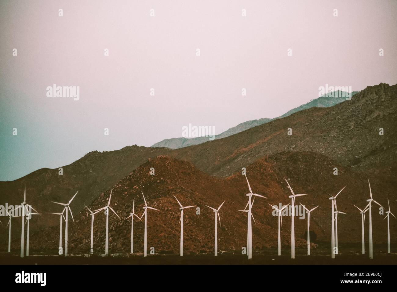 Dry landscape with wind turbines or windmills for renewable electric ...