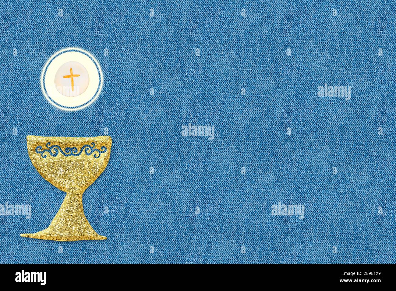 First Communion invites background. Chalice and host on a denim ...