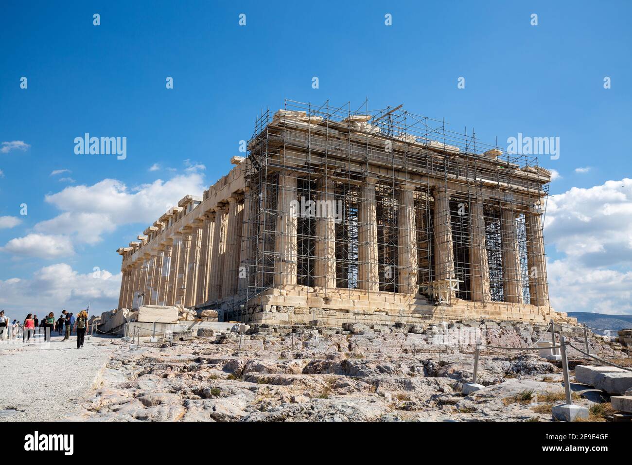 Low angle shot of a wonderful ancient building with huge columns made ...