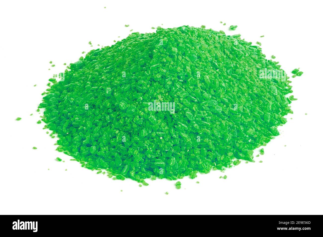 Pile of dry green chemical granules - close-up isolated on white ...