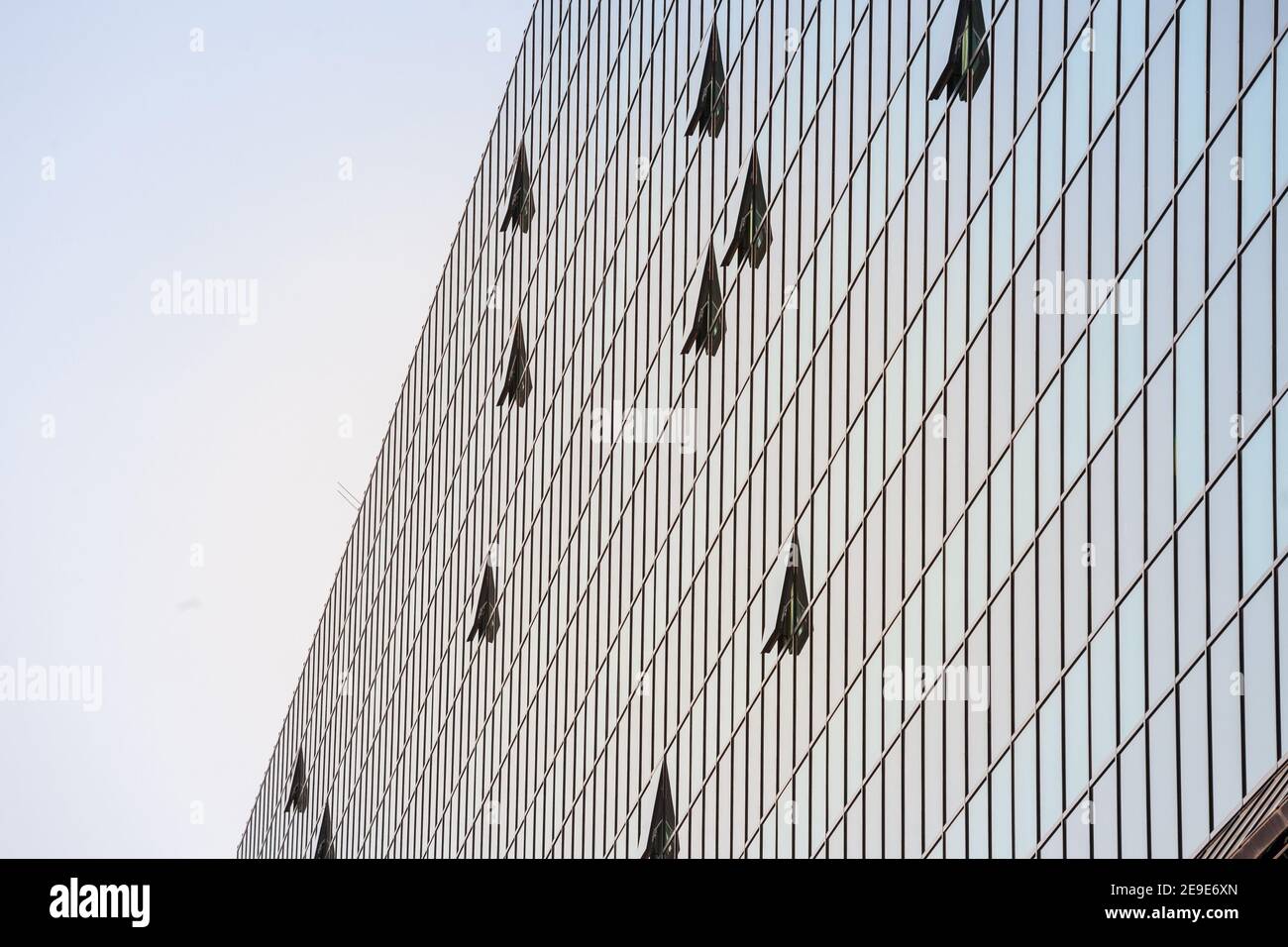 abstract facade of a finance business building with mirror windows ...
