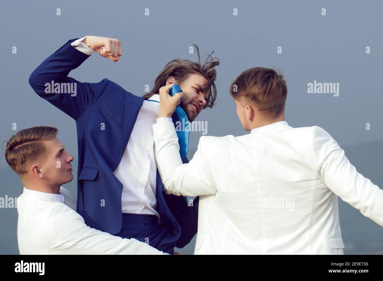Business man fighting. Businessman punching, hitting colleague, twin ...