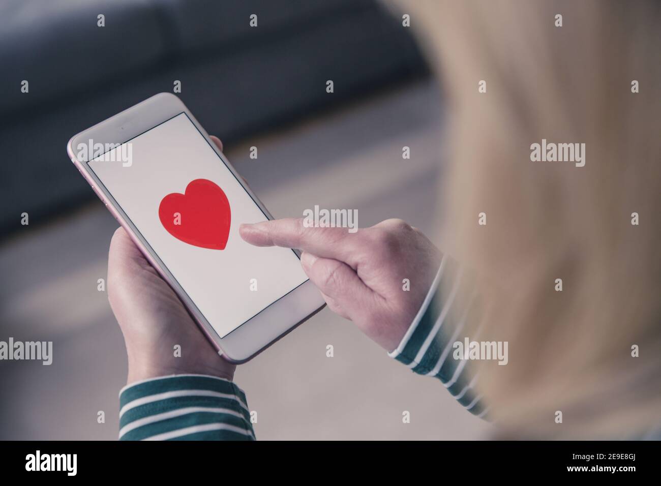 Tapping on mobile phone hi-res stock photography and images - Alamy