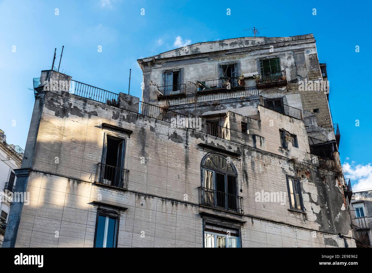 Facade of an old classic building in the historical center of Naples ...