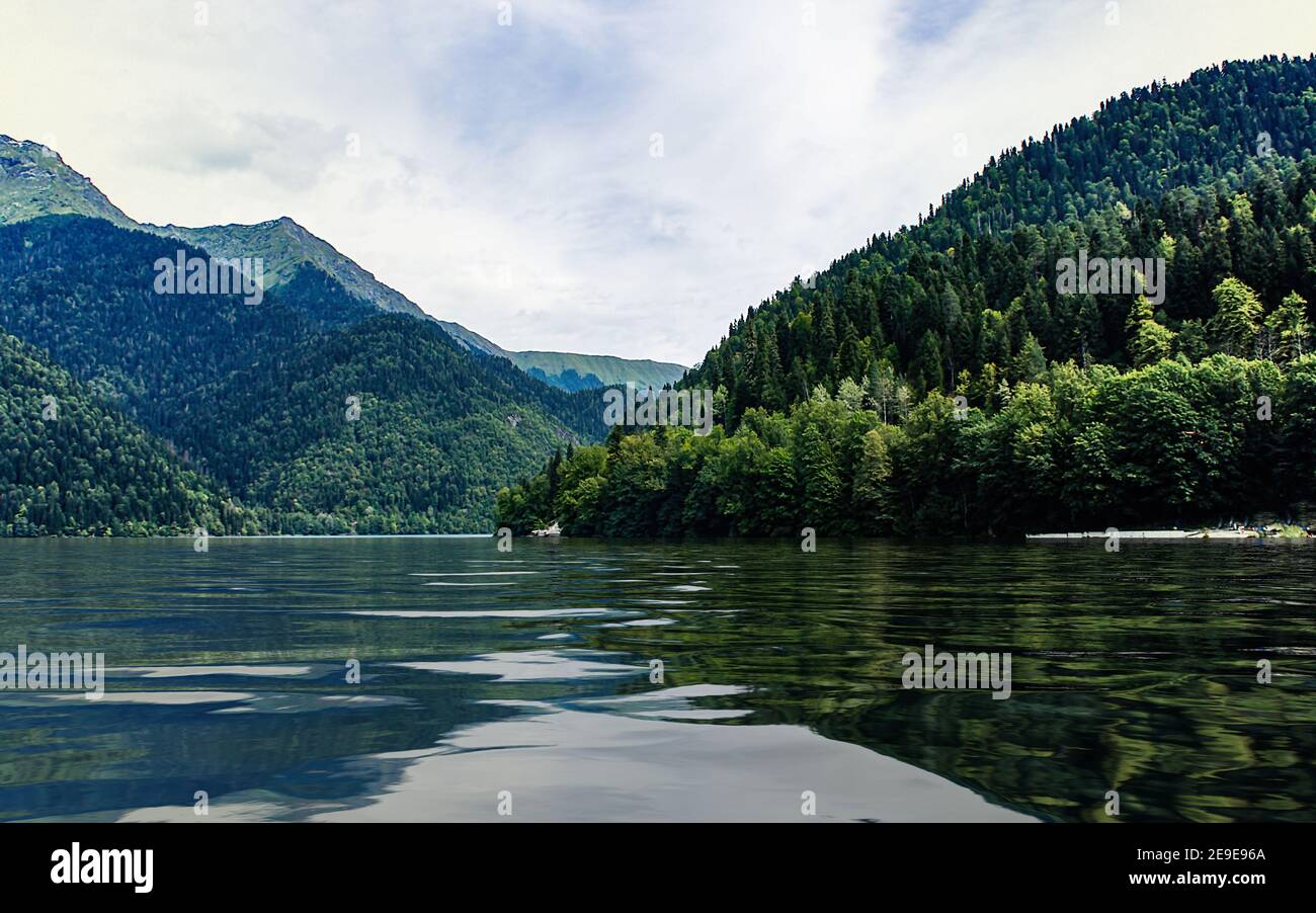Natural landscape with lake Ritsa and beautiful mountains Stock Photo ...