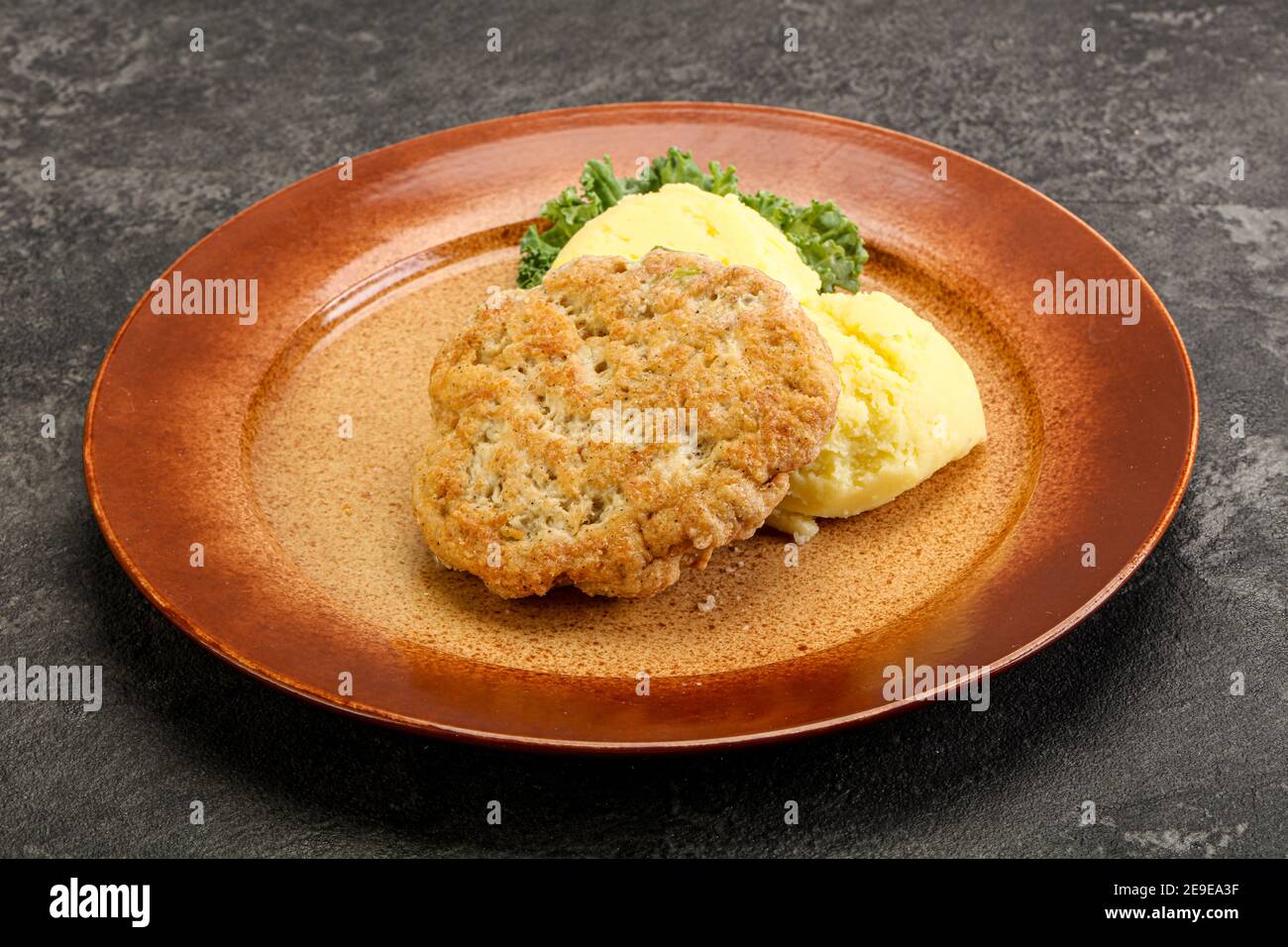 Minced Chicken cutlet with mashed potato Stock Photo - Alamy