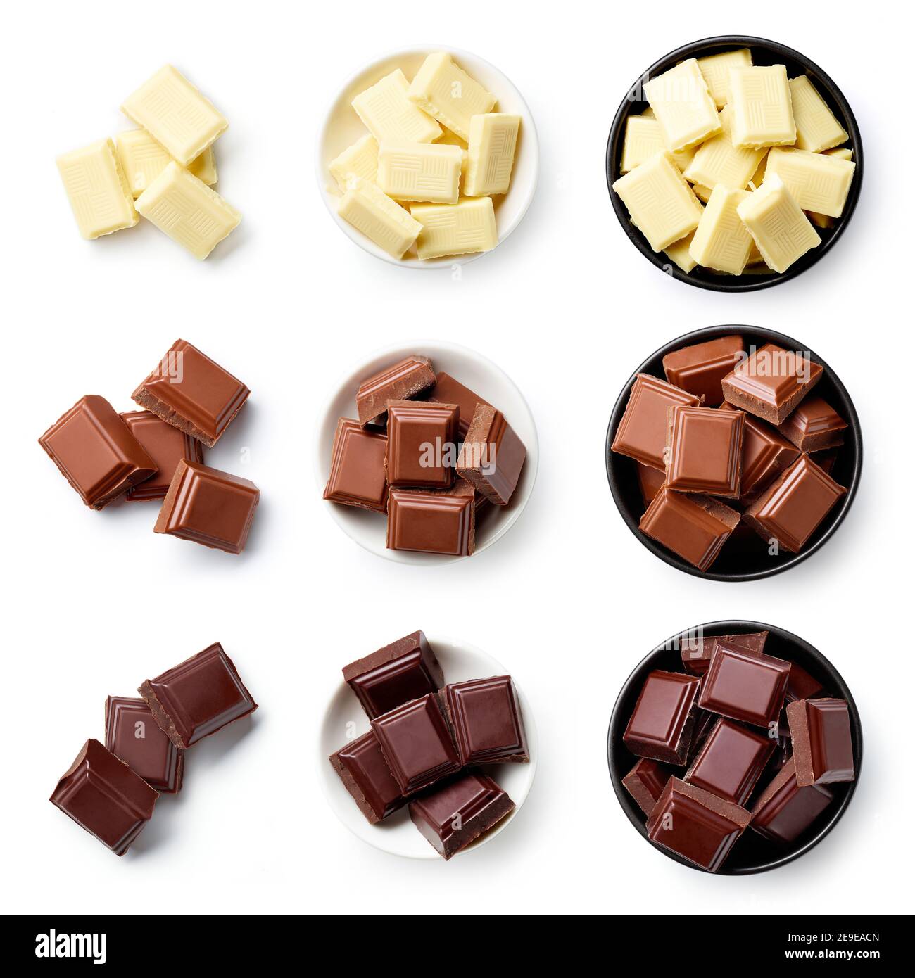 Set of dark, white and milk chocolate pieces isolated on white ...