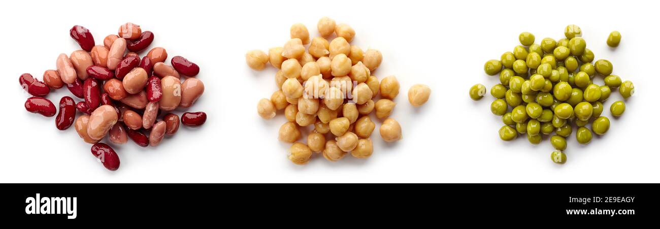 Heap of preserved beans, chickpeas and green peas isolated on white ...