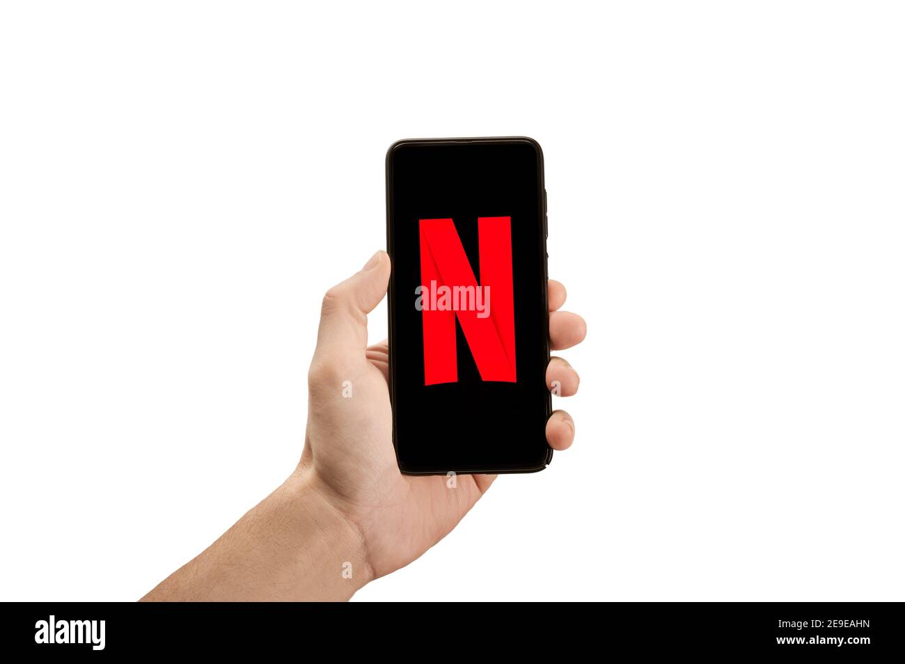 USA, NEW YORK February 2, 2021: Close up of phone with NETFLIX new logo ...