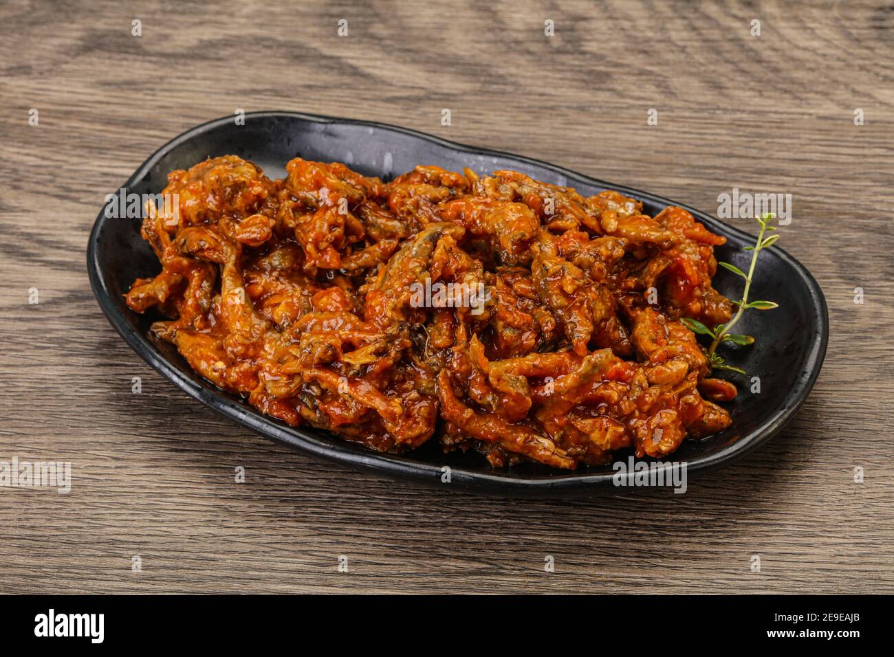 Canned anchovy snack in tomato sauce Stock Photo - Alamy