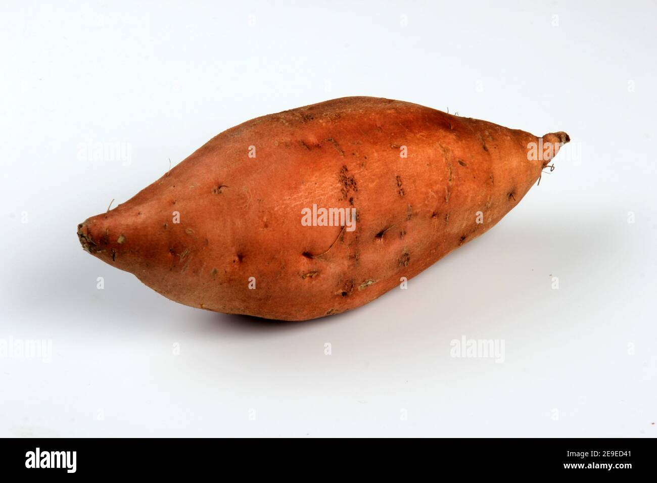 Sweet potatoes, batata isolated on white background. Ipomoea batatas ...