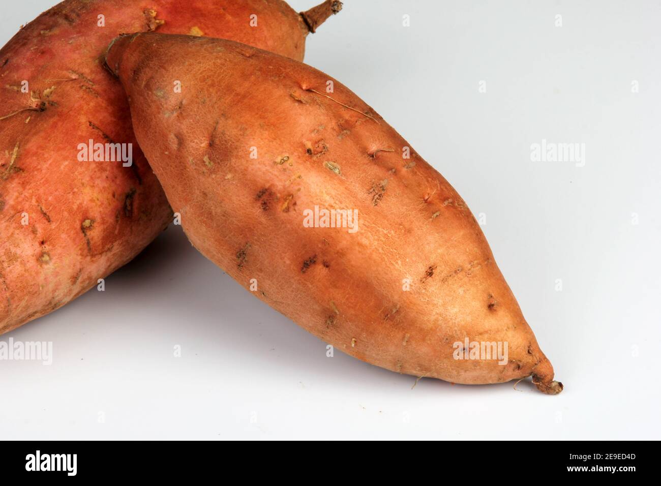 Sweet potatoes, batata isolated on white background. Ipomoea batatas ...