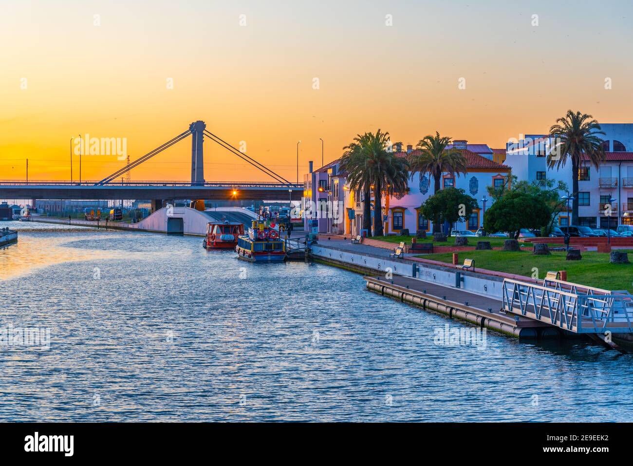 Moliceiro boats mooring alongside the central channel at Aveiro ...