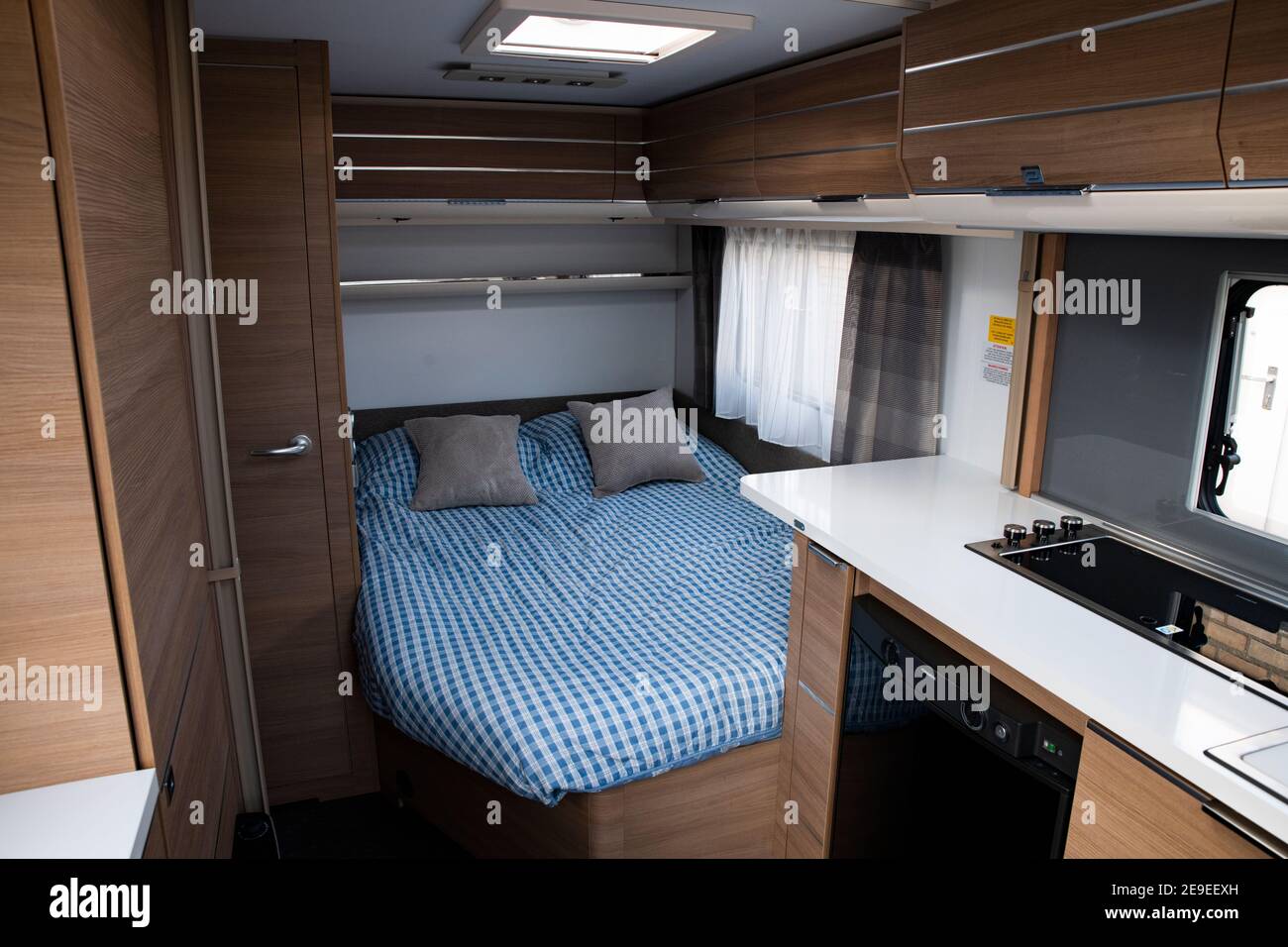 kitchen and bed of new expensive caravan mobile home Stock Photo - Alamy