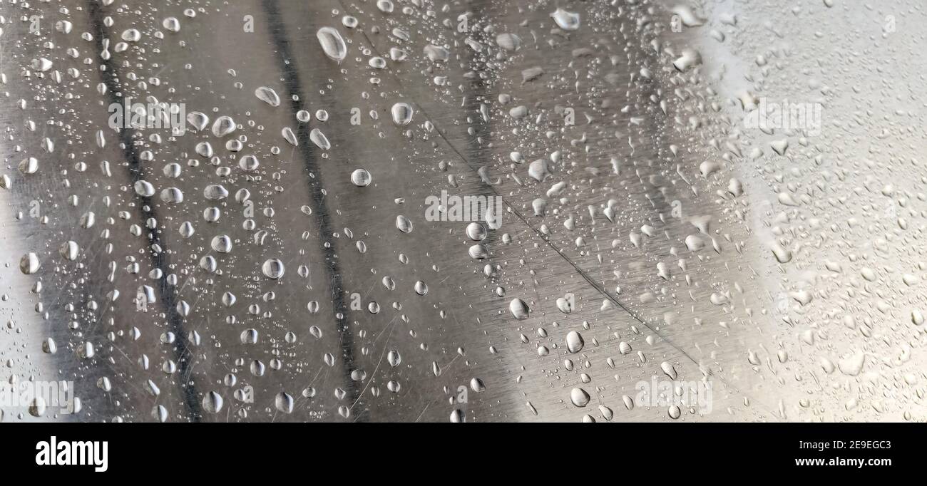 Closeup of water droplets of different sizes on the window glass Stock ...