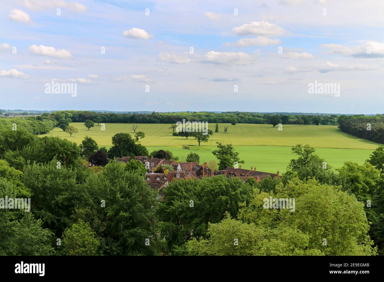 English countryside grass fields with roof of building in fron Stock ...