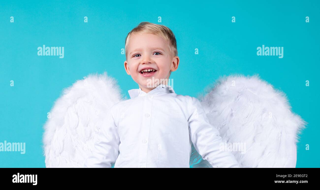 Little angel boy making funny face. Valentines angels. Cute cupid boy ...