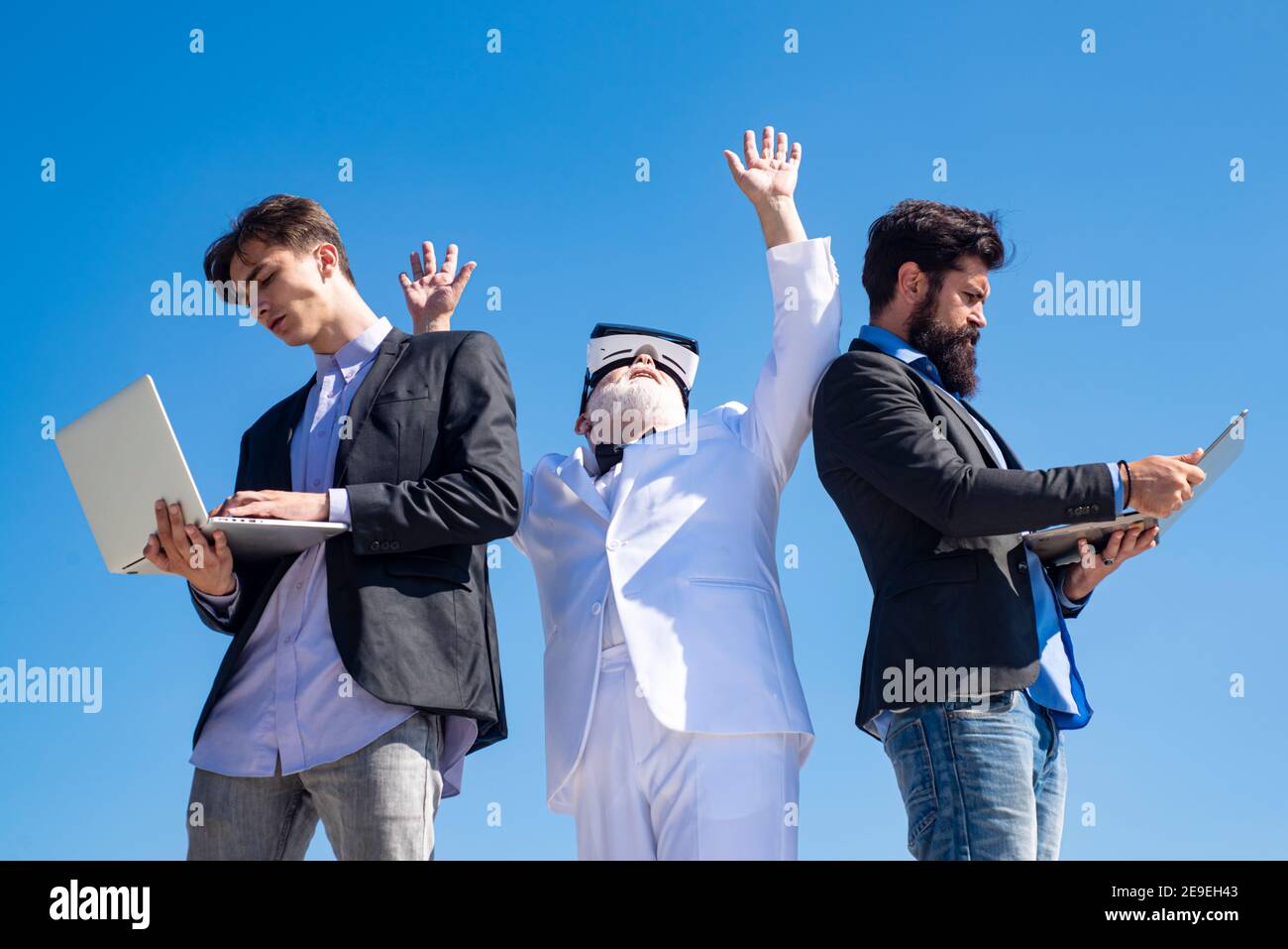 Business teamwork. Coworkers. Team with laptop and vr. Business people ...