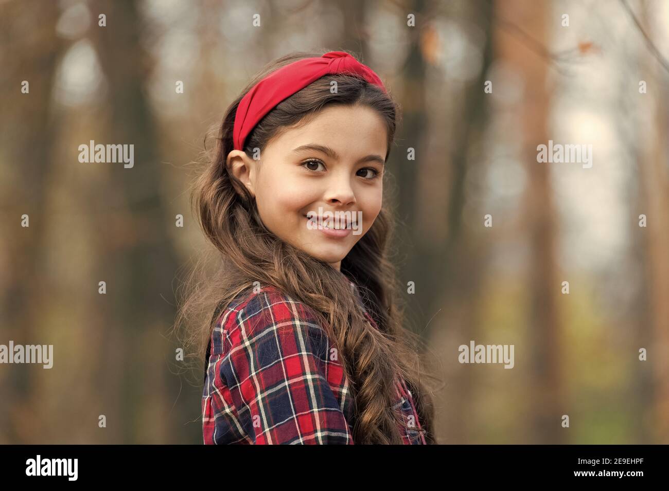 Smiling girl wear knotted headband. Biggest Hair Accessory Trends ...