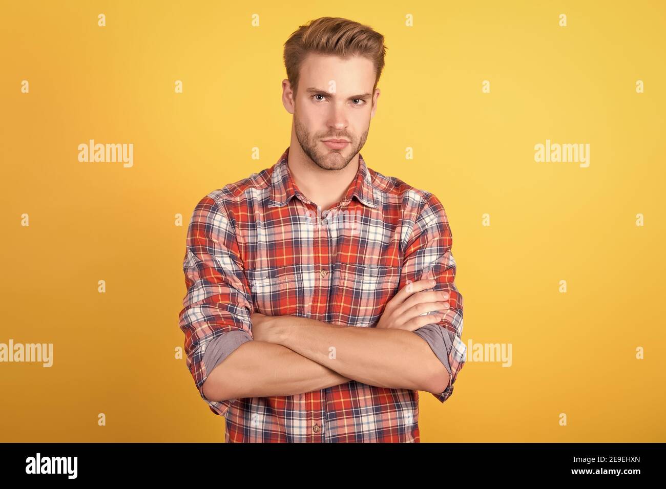 Being serious. Menswear shop. Macho man wearing checkered shirt ...