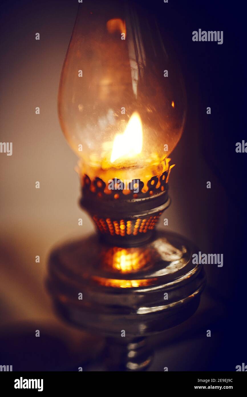 Old oil lamp burning bright hi-res stock photography and images - Alamy