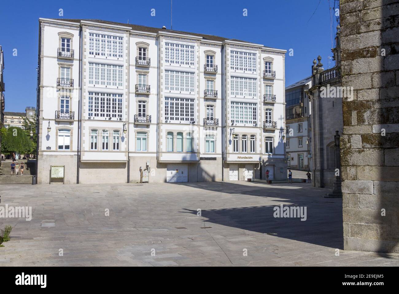 Vintage stone building under a clear blue sky Stock Photo - Alamy