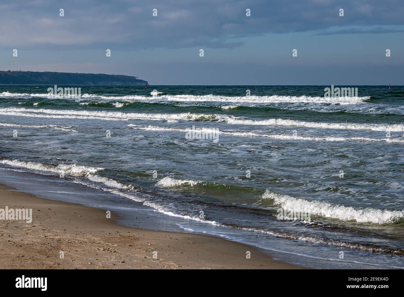 Waves on the beach in Warnemuende, Germany Stock Photo - Alamy