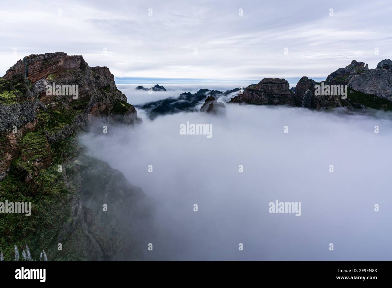 Mountain peaks at the height of clouds on Madeira Island Stock Photo ...